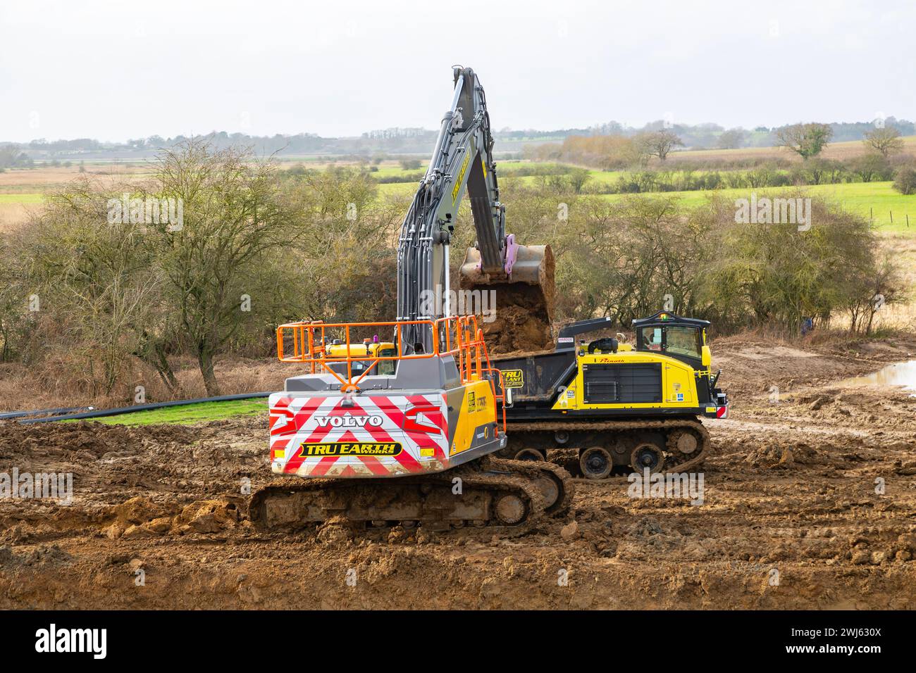 TRU PLANT hire Volvo excavator loading tipper heavy plant machinery ...
