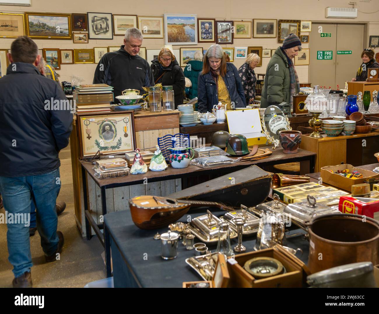 People viewing lots on display at auction room viewing, Campsea Ashe ...