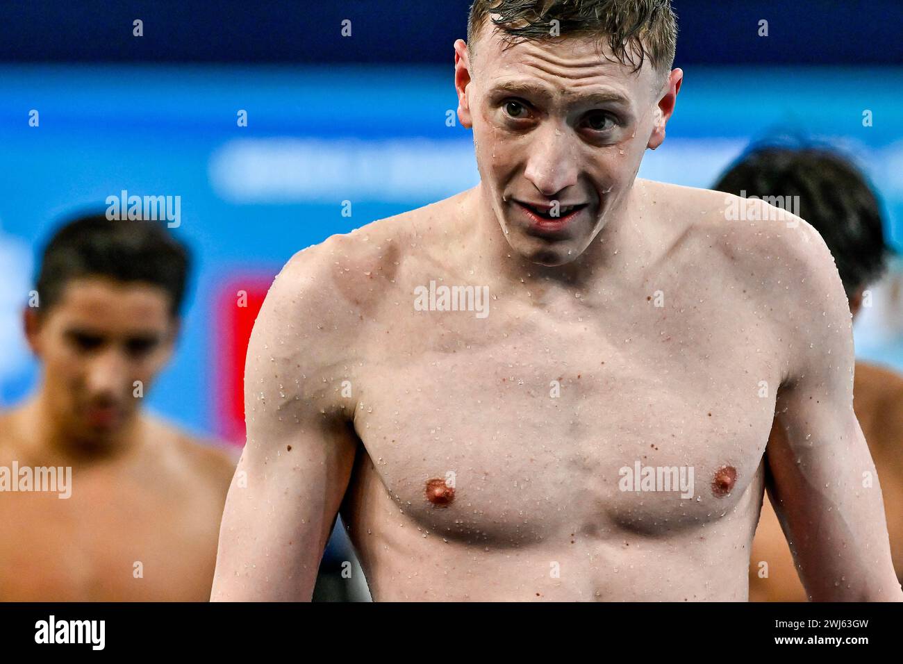 Doha, Qatar. 13th Feb, 2024. Max Litchfield of Great Britain reacts ...