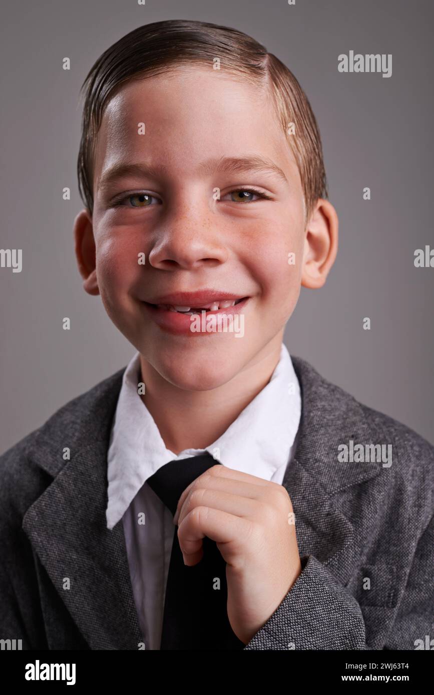 Smile, fashion and portrait of child in studio with classy, fancy and ...