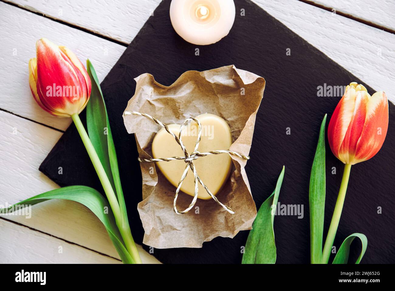 Homemade solid moisturizing hand cream. Heart shape cream bar made of ...