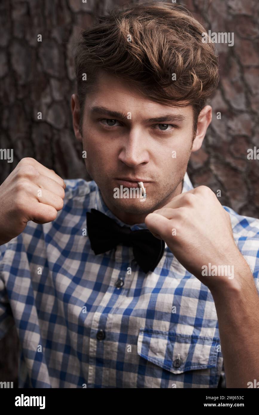 Guy smoking cigarette in forest hi-res stock photography and images - Alamy
