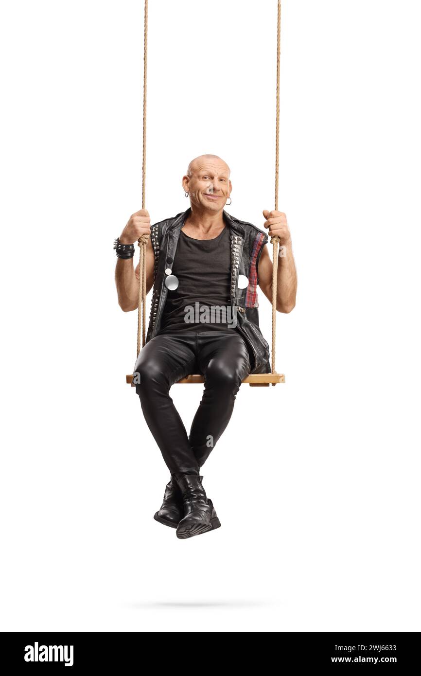 Punk sitting on a swing and smiling isolated on white background Stock ...