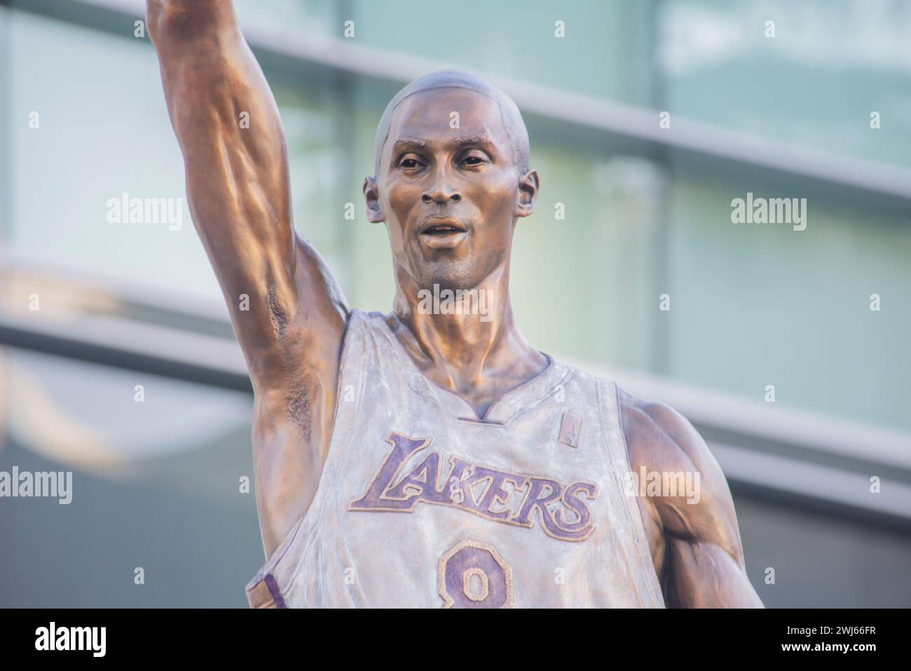 A statue of Kobe Bryant, hundreds of people lined up Friday morning to ...