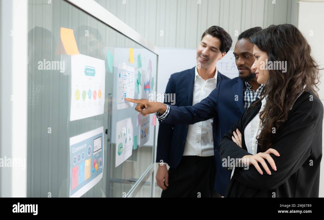 Group of business people discussing the charts and graphs showing the ...