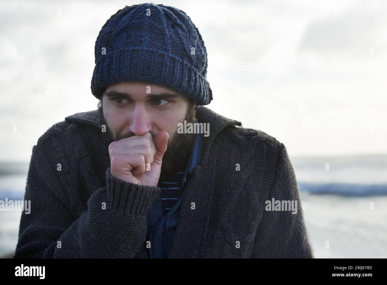 Winter, breathing and beach with man, thinking and cold weather with ...