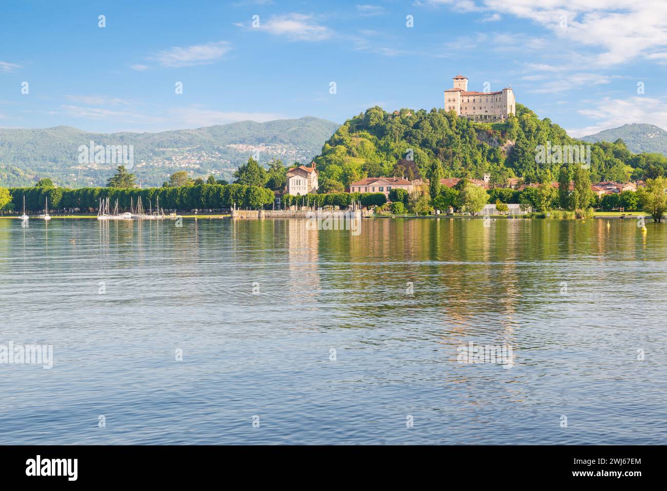 Lake Maggiore with the city of Angera and the castle or Rocca of Angera ...