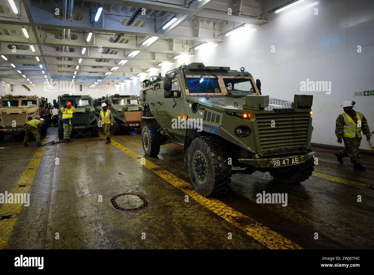 Vehicles and equipment after being loaded onboard MV Anvil Point at the ...
