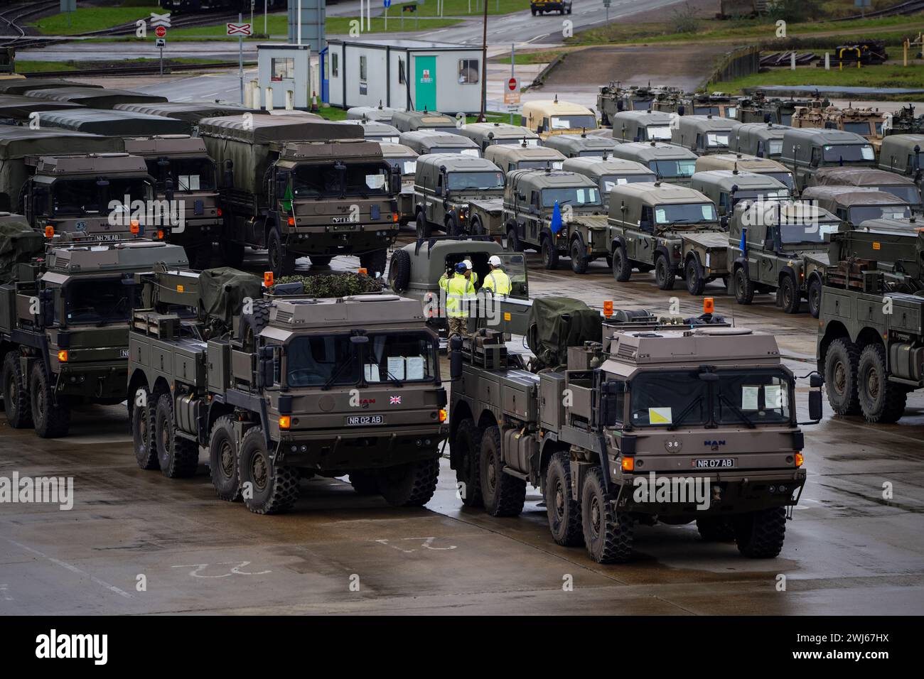Vehicles and equipment before being loaded onboard MV Anvil Point at ...