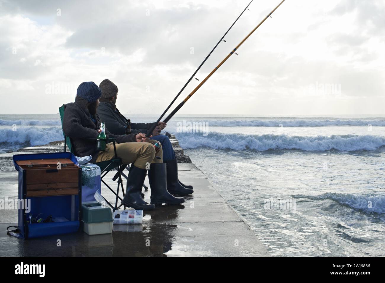 Man relaxing in chair fishing hi-res stock photography and images - Alamy