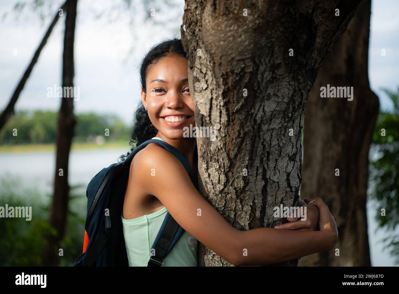 Beautiful woman backpack standing outdoors hi-res stock photography and ...