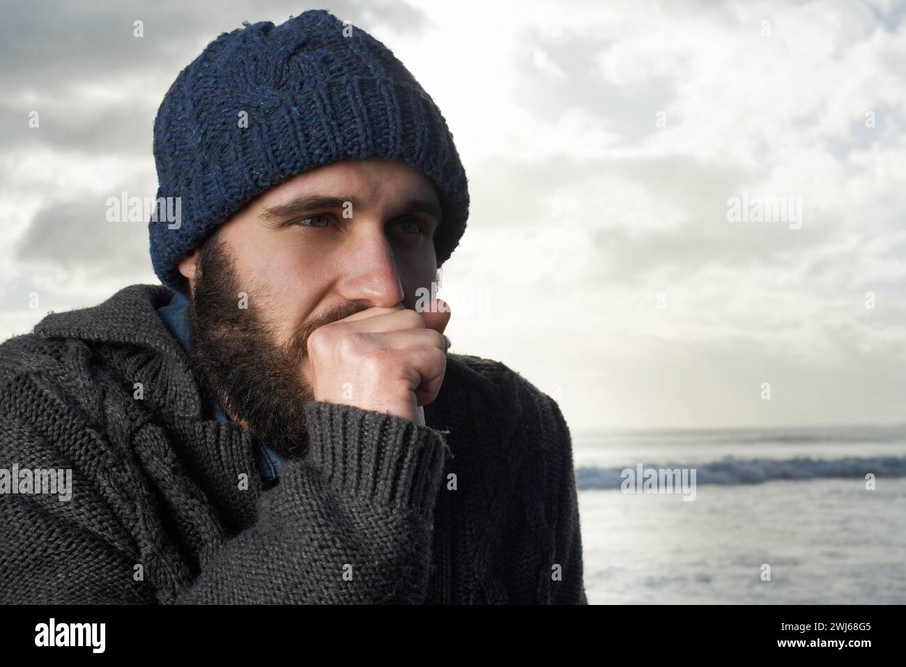 Winter, breathing and ocean with man, thinking and cold weather with ...