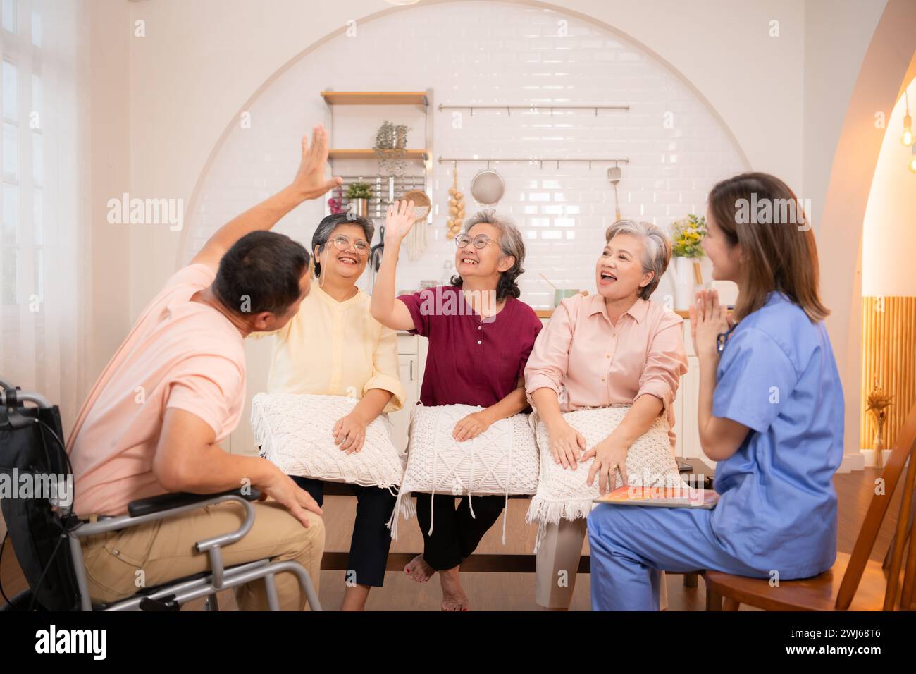 Group of elderly and senior man in wheelchair with nurse at nursing ...