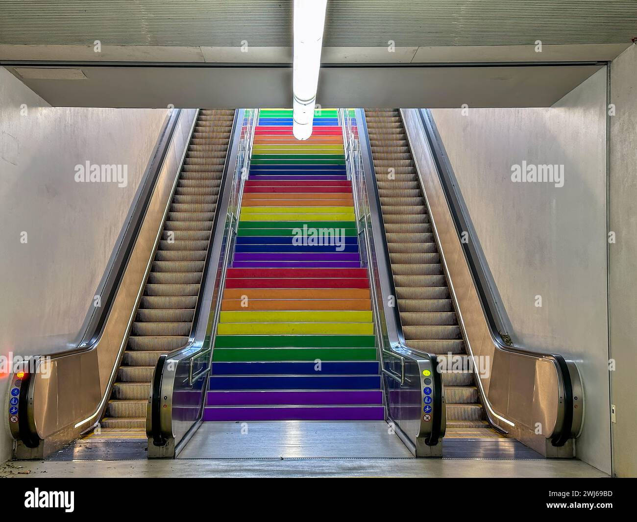 The rainbow symbol on escalator inside subway station in Alicante ...