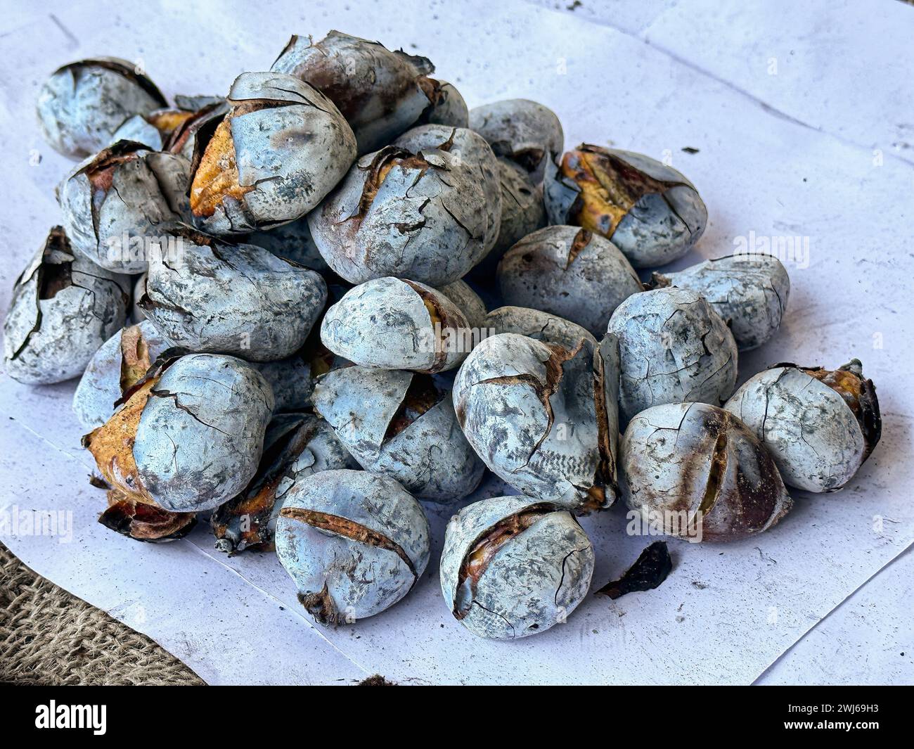 Roasted chestnuts, street food in Lisbon, Portugal Stock Photo - Alamy