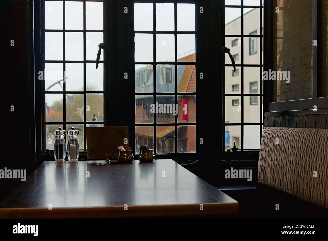 An empty table beside a window inside Stokes High Bridge Cafe in ...