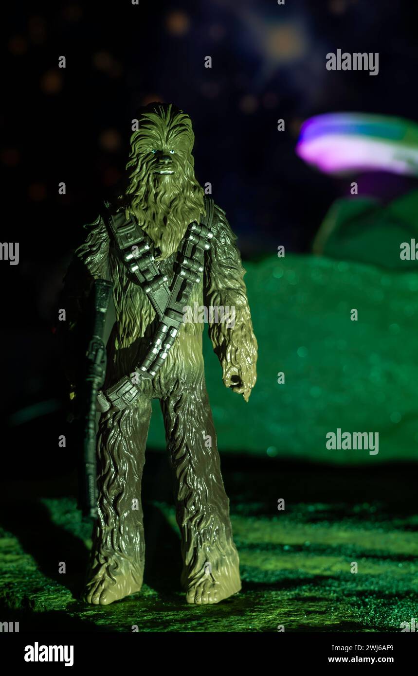 Chewbacca figure placed on a rocky planet with the Millennium Falcon in ...