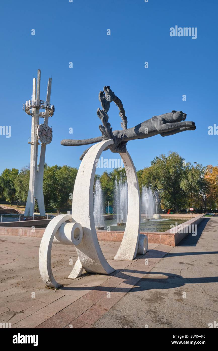Detail of a sculpture of a tiger flying through a flaming hoop. At the ...