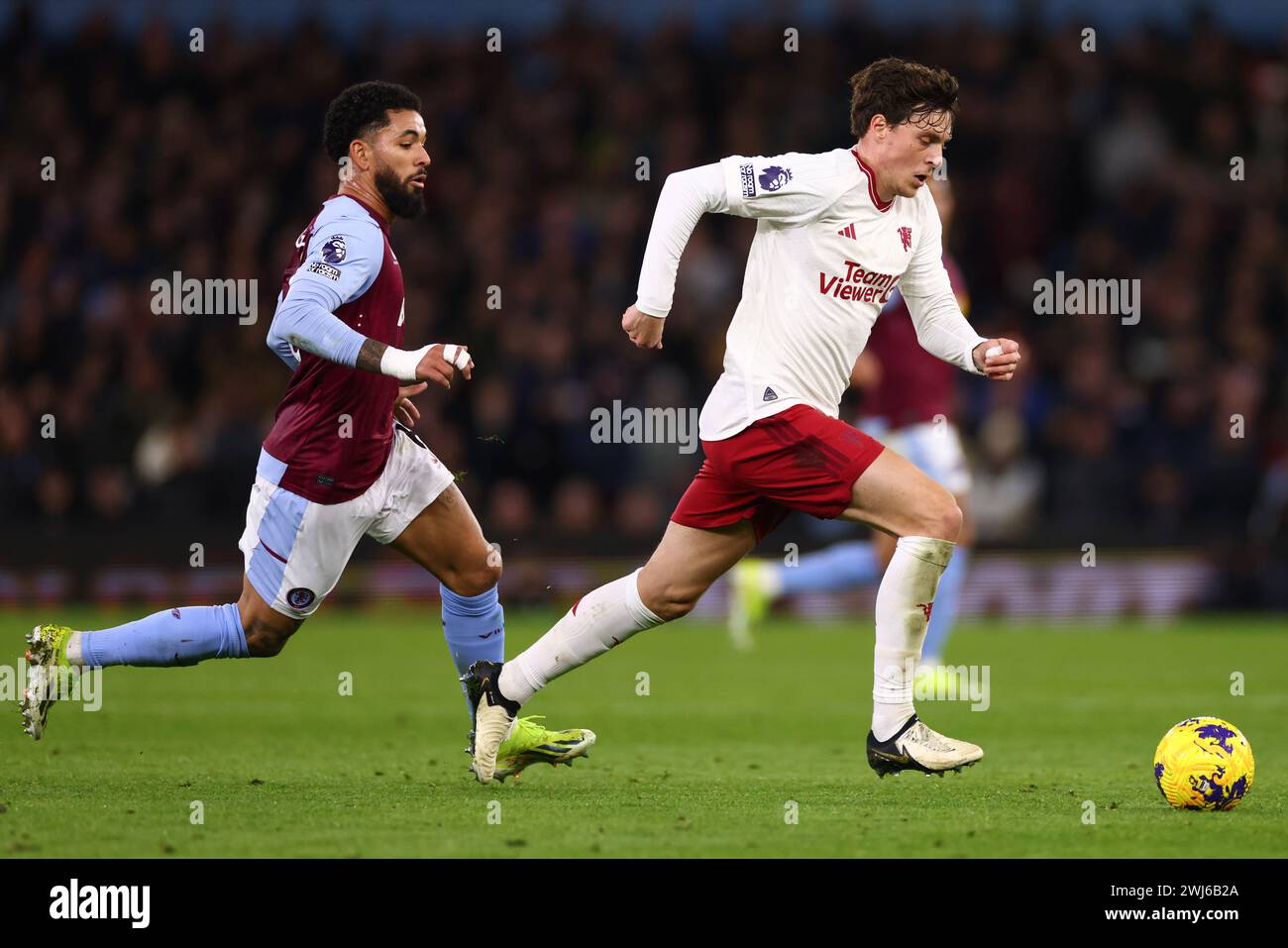 Victor Lindelof of Manchester United in action with Douglas Luiz of ...