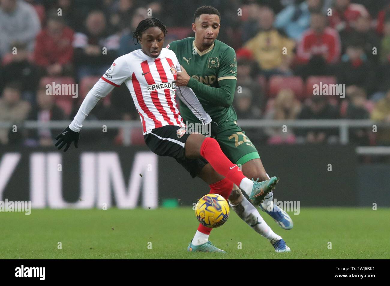 Romaine Mundle of Sunderland and Brendan Galloway of Plymouth Argyle ...