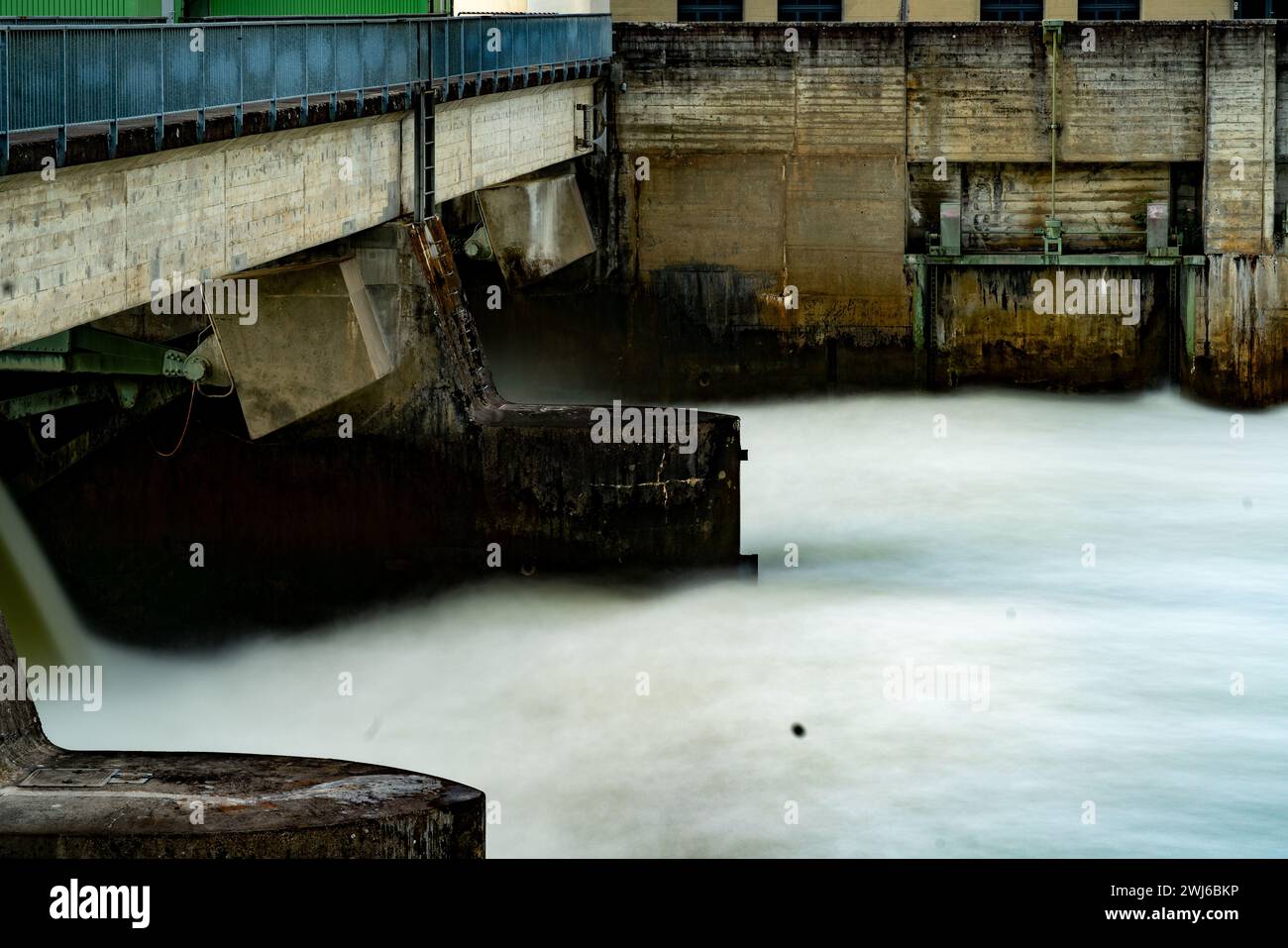 Water shooting through the weir of an electrical power plant. Smoothed ...