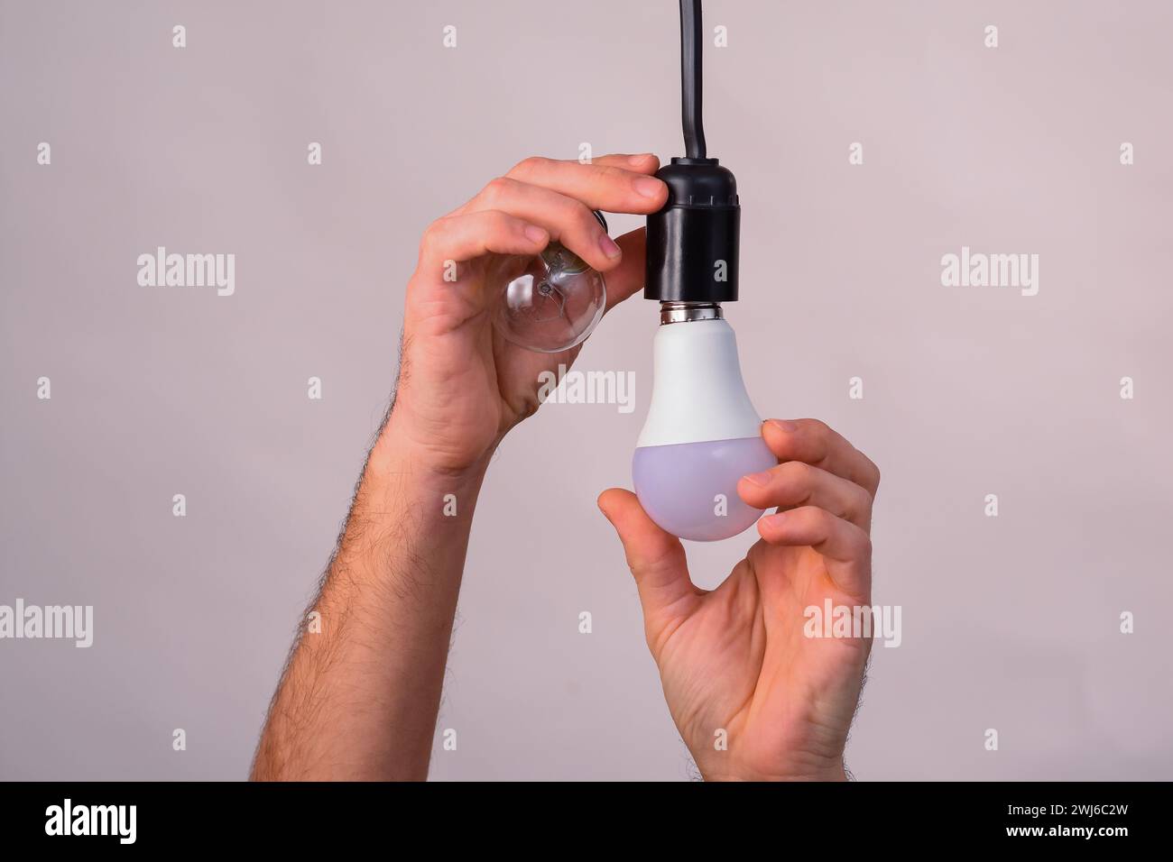 installation of an LED lamp. The concept Stock Photo - Alamy