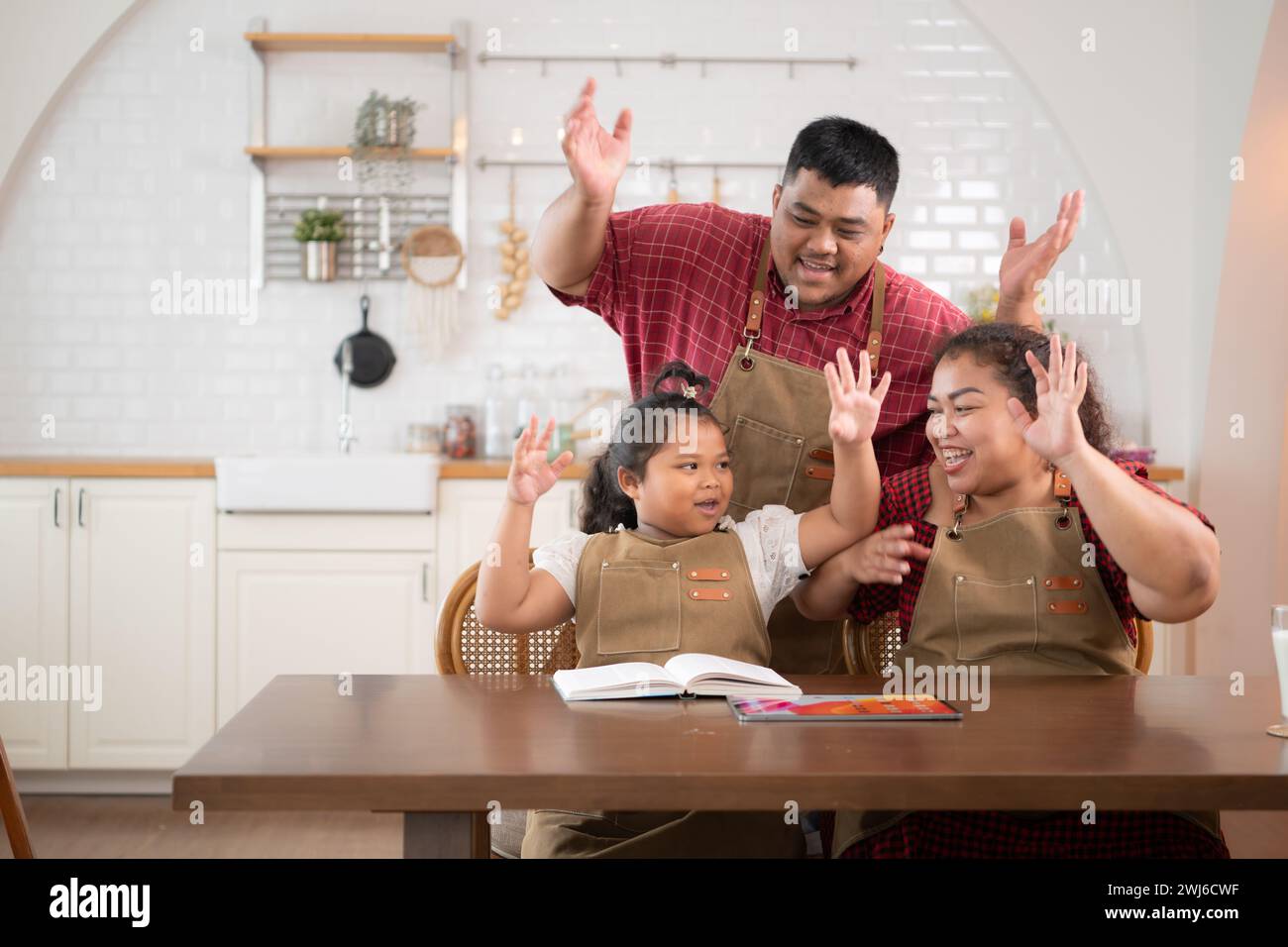 A plus-size family with a father wearing a prosthetic leg, is happily ...