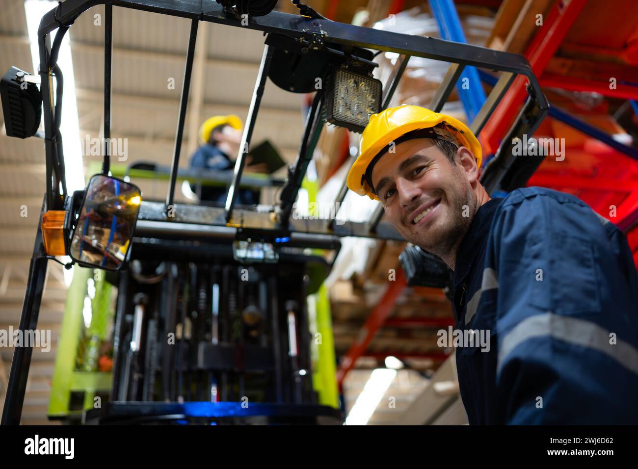Warehouse workers using forklift to check and counting in a large ...