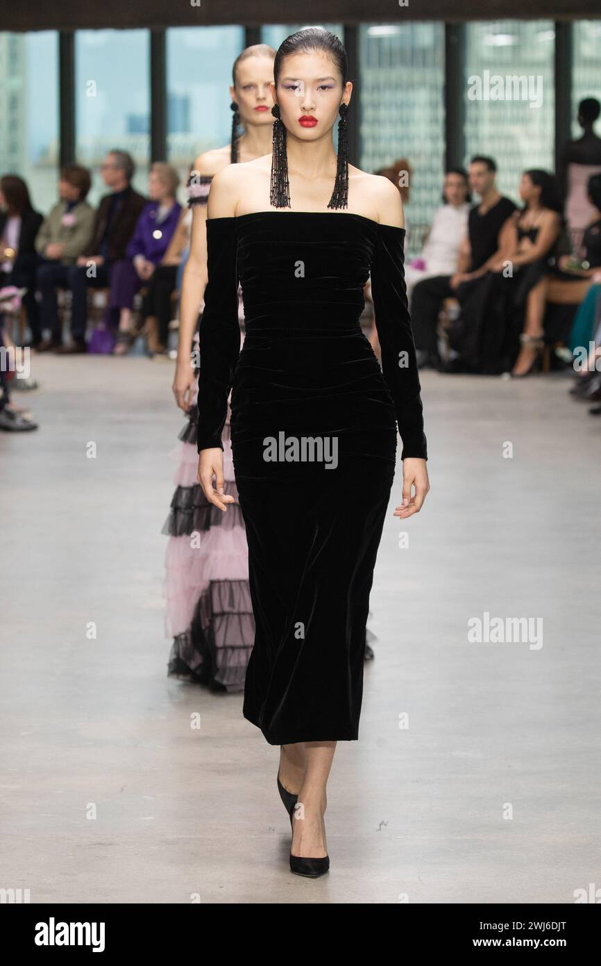Model Ying Ouyang walks on the runway at the Carolina Herrera fashion ...