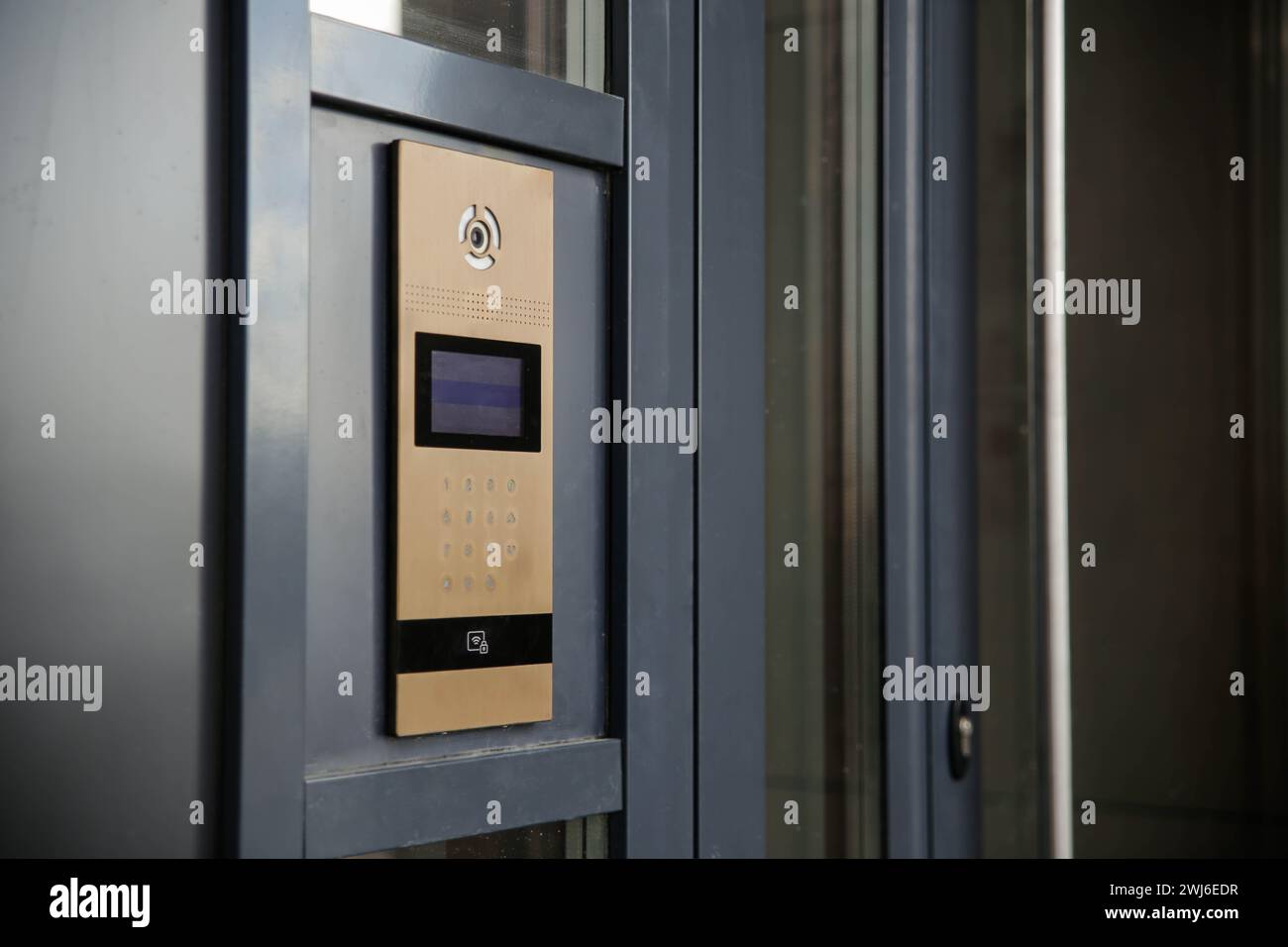 Modern entrance doorbell intercom in apartment building, with a video ...