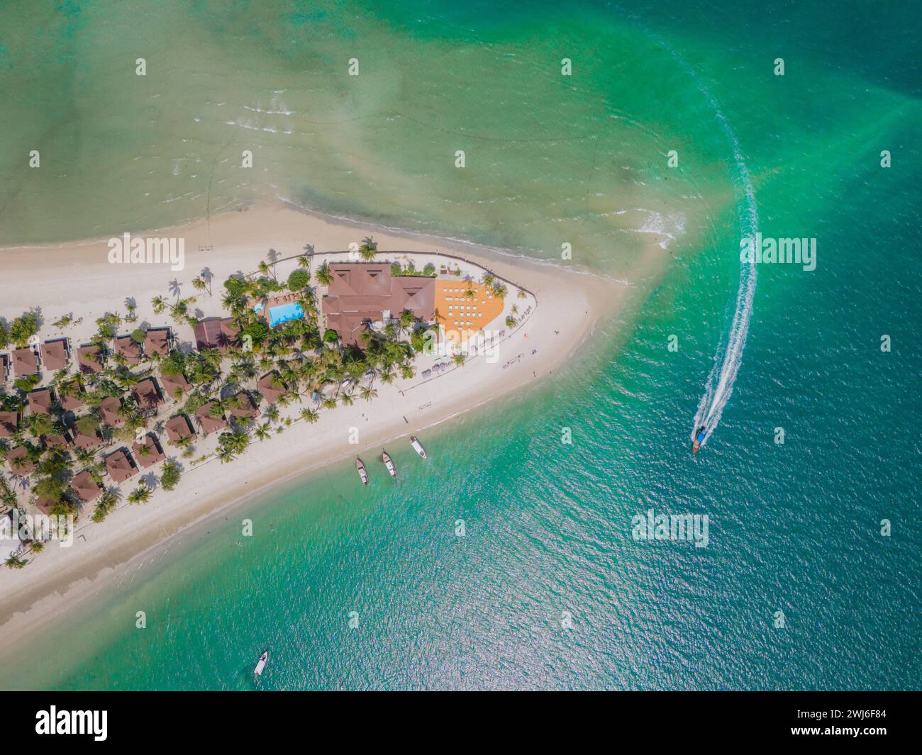 Drone aerial view at Koh Muk a tropical island with palm trees and soft ...