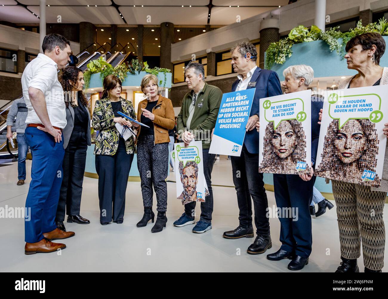 THE HAGUE - Kitty Jong (4th L, FNV) during the presentation of an FNV ...