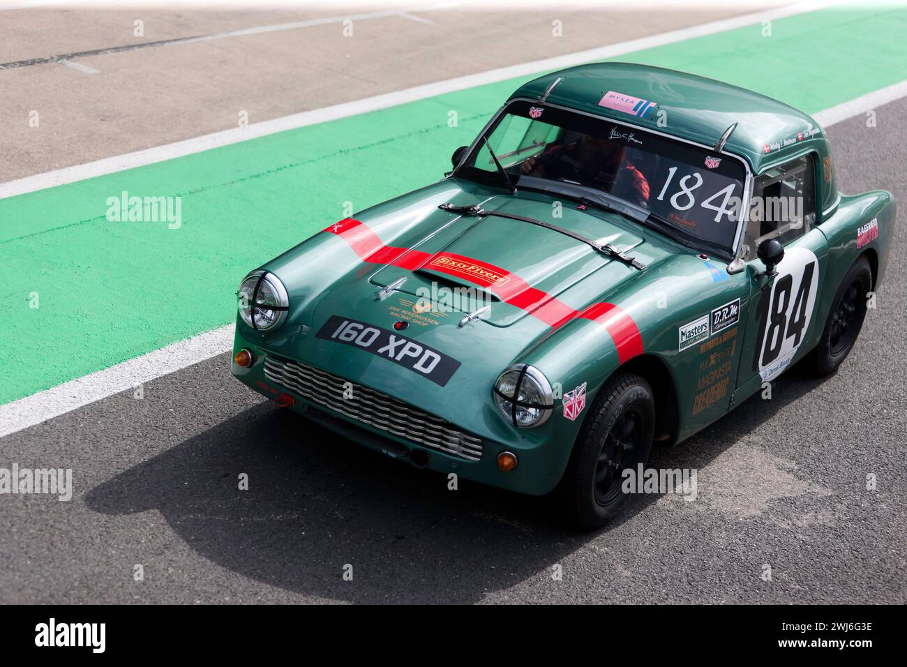 Nikolaj Mortensen driving his Green, 1962, Turner 1650 down the Pit ...