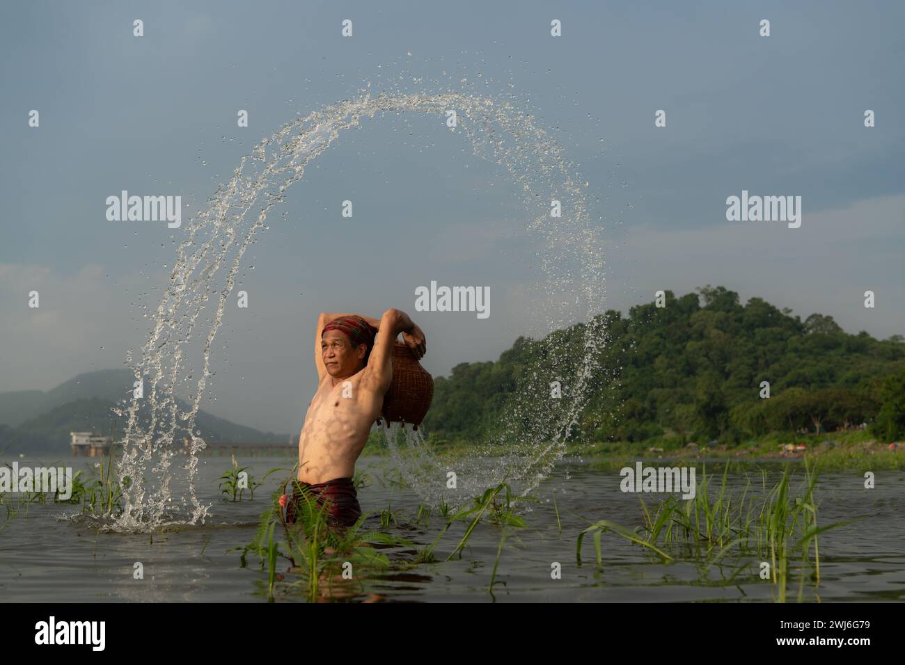 Fishermen using traditional fishing equipment After catching fish ...