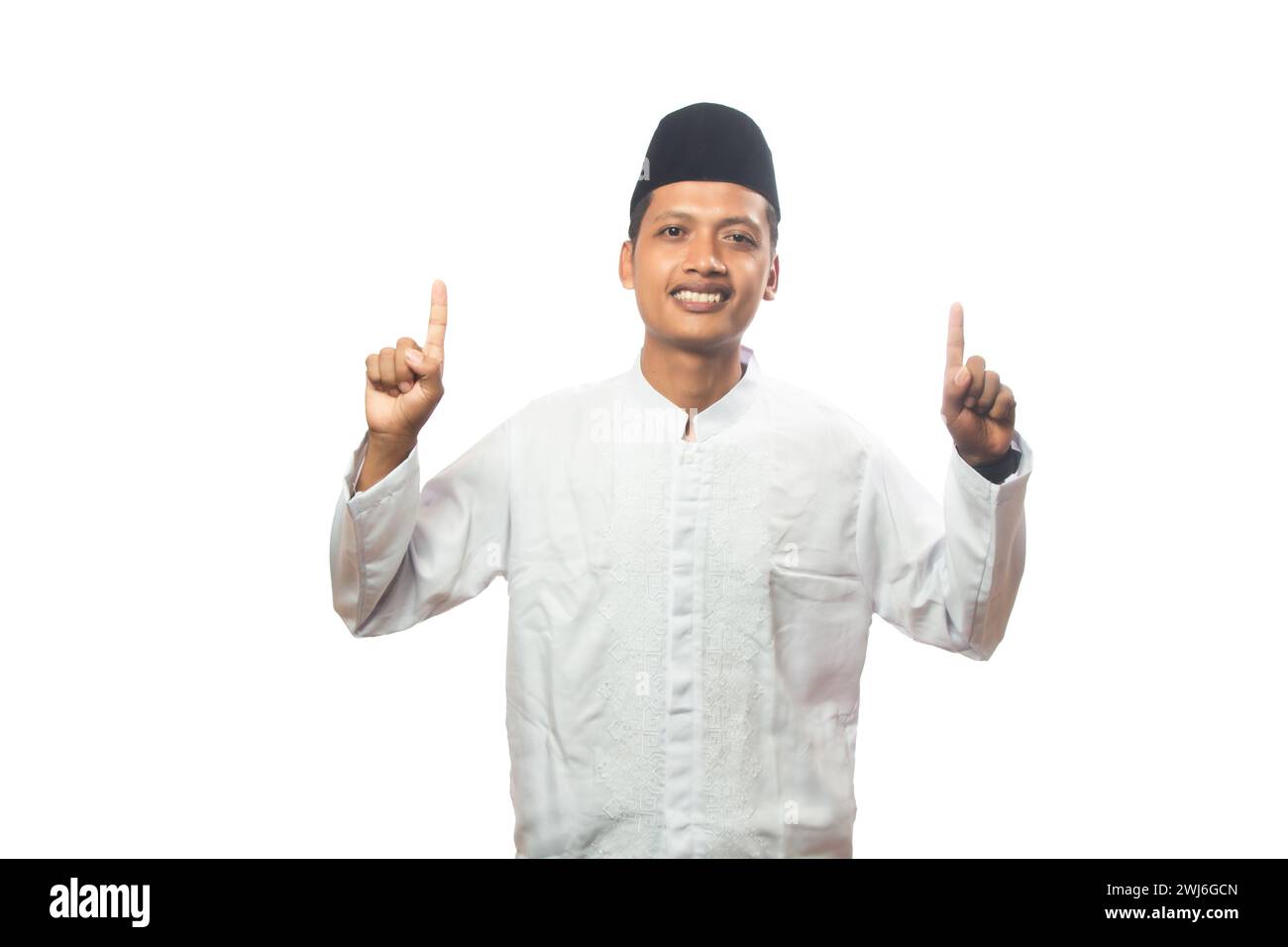 Brown skinned Asian Muslim man showing happy expression while both ...