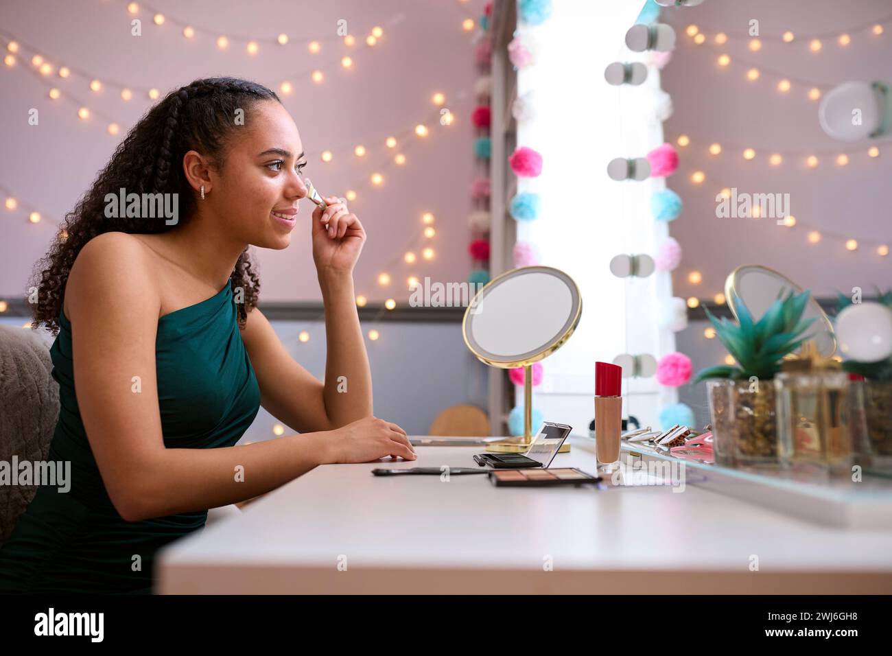 Teenage Girl At Home In Bedroom Getting Ready For Prom Or Night Out ...