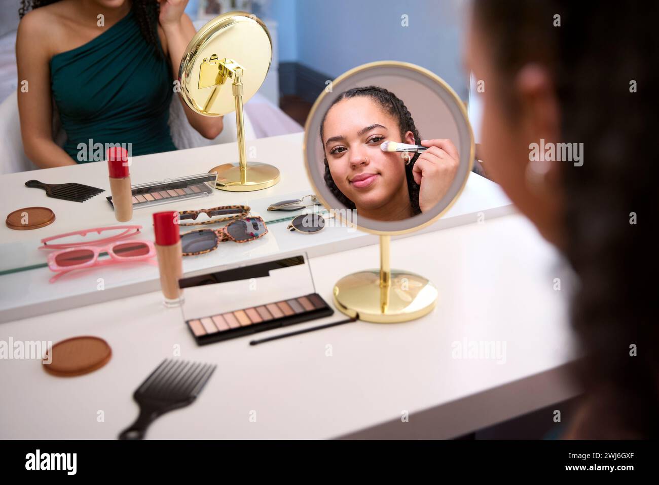 Teenage Girl At Home In Bedroom Getting Ready For Prom Or Night Out ...