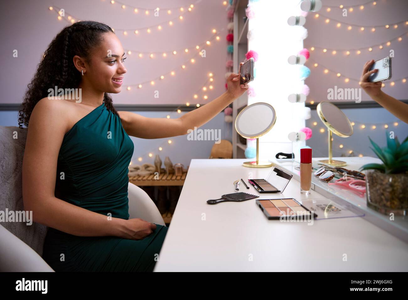 Teenage Girl At Home In Bedroom Getting Ready For Prom Or Night Out ...