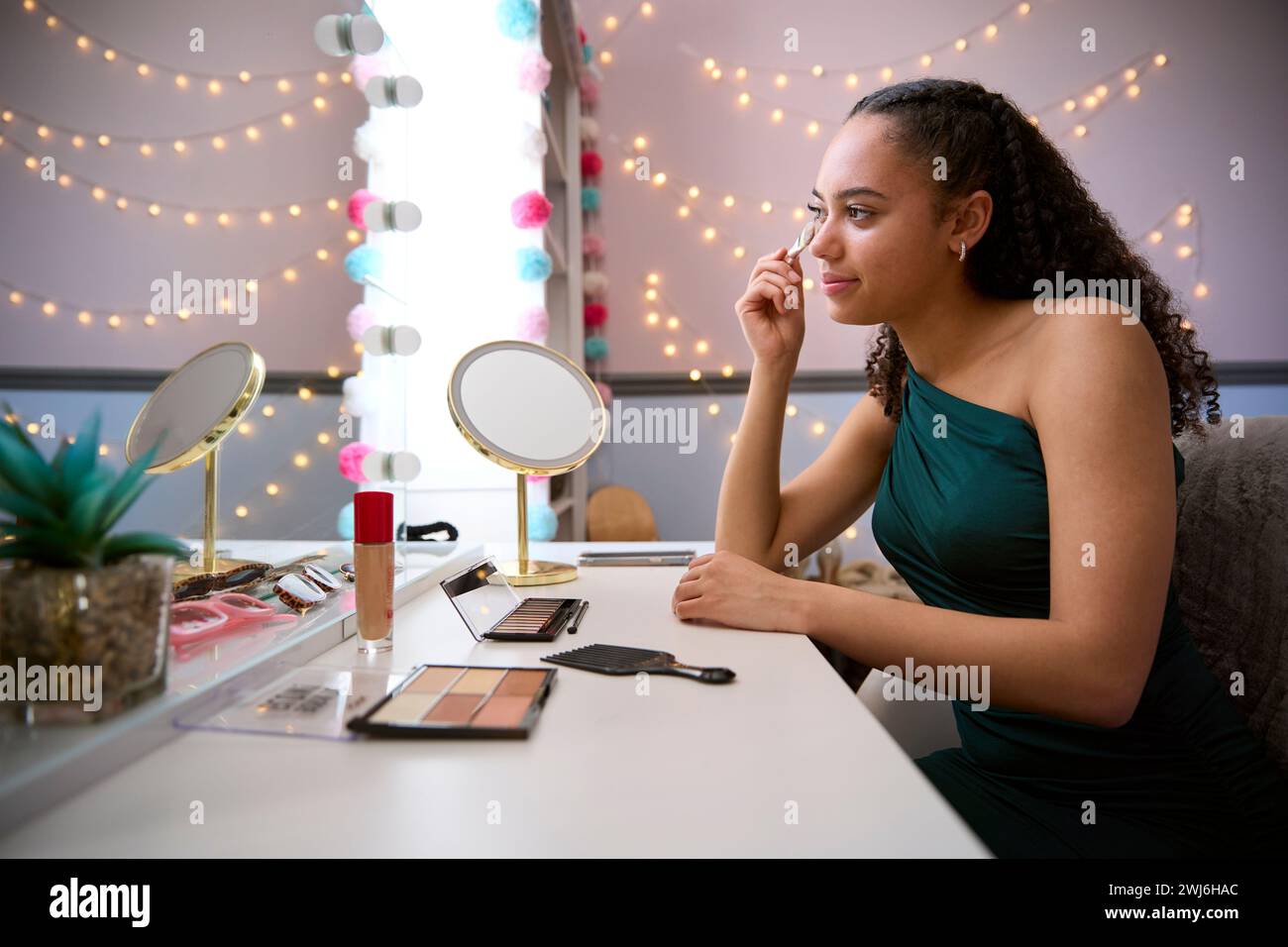 Teenage Girl At Home In Bedroom Getting Ready For Prom Or Night Out ...