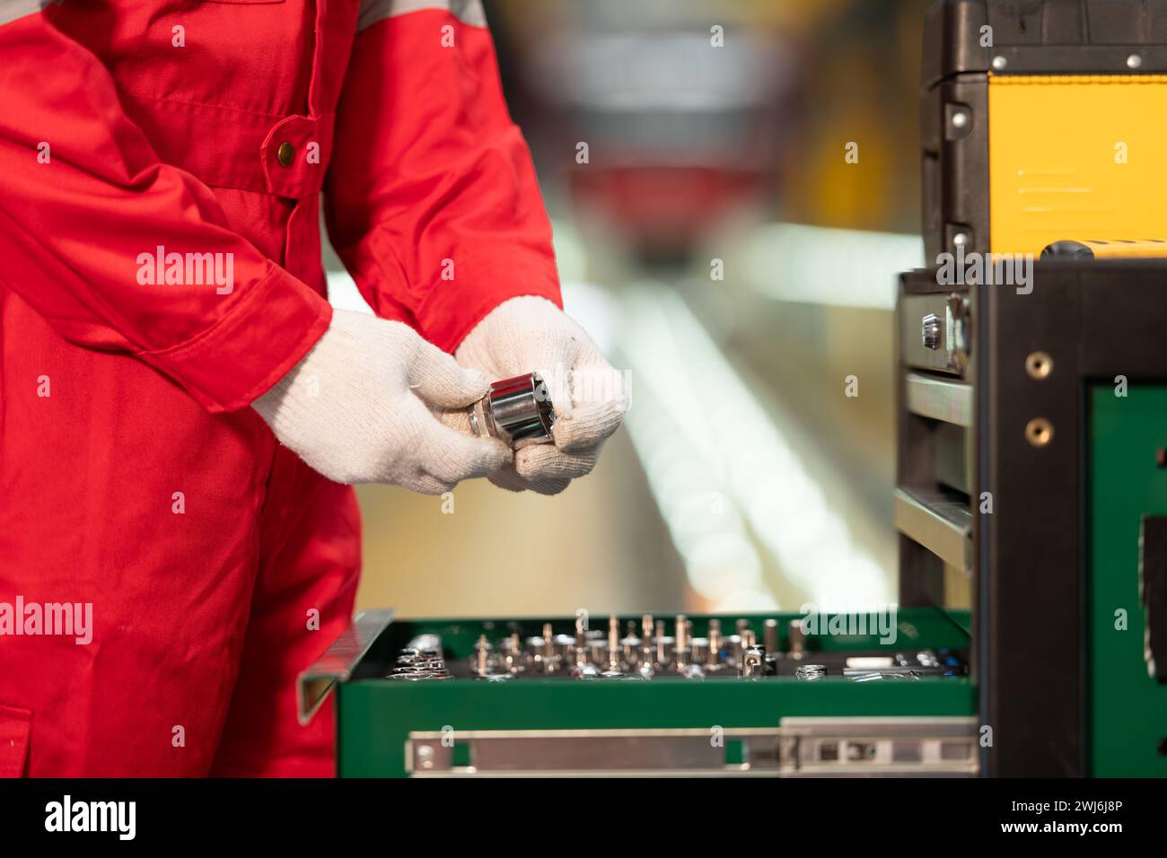 Picture of engineer using repair tools of the electric train industry ...