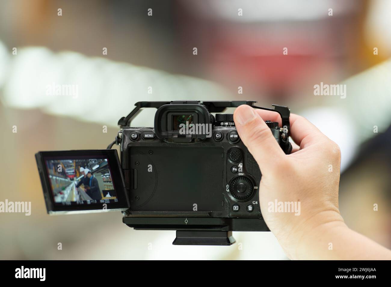 A reporter used a camera to take photos of the two businessmen who ...