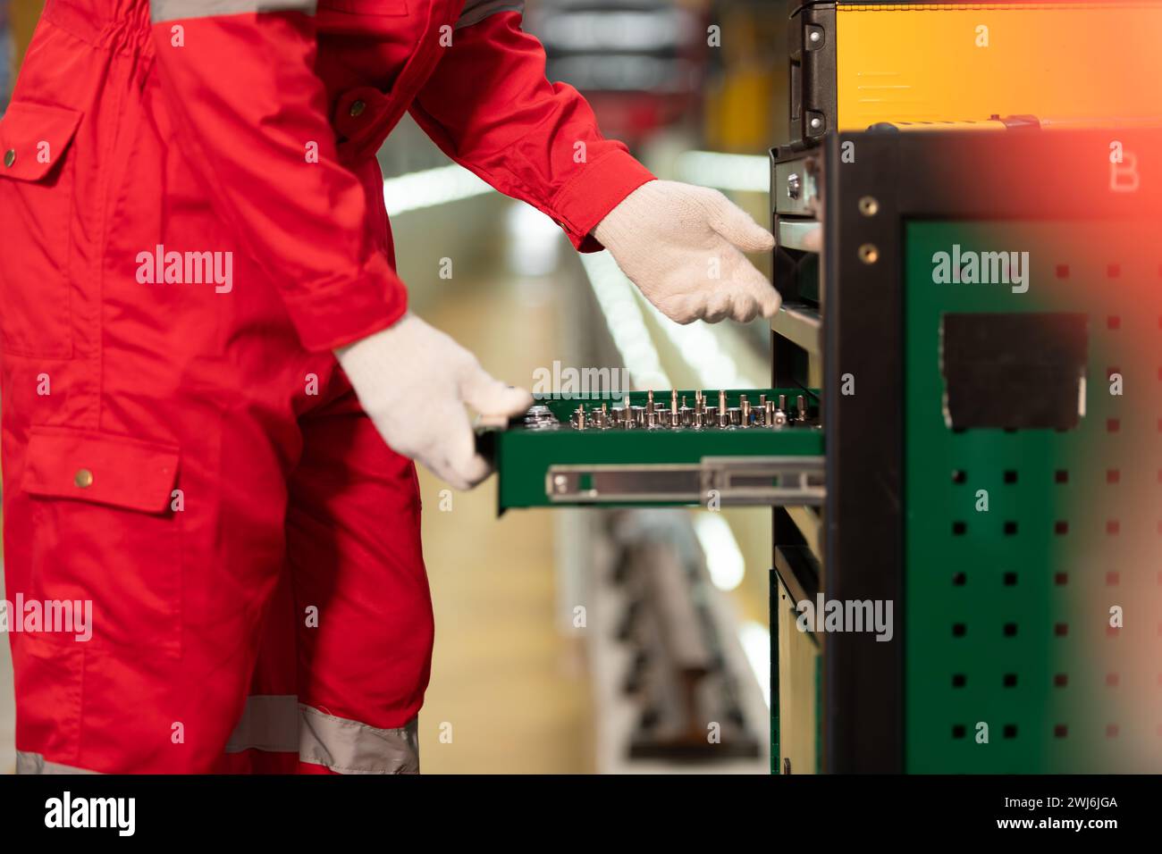 Picture of engineer using repair tools of the electric train industry ...