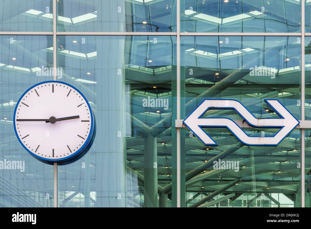 The Hague, The Netherlands - January 31, 2024: Railway clock and logo ...