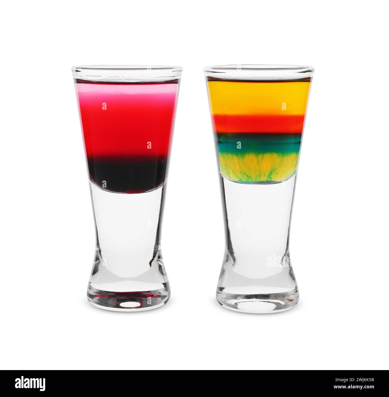 Two shooters in shot glasses isolated on white Stock Photo - Alamy
