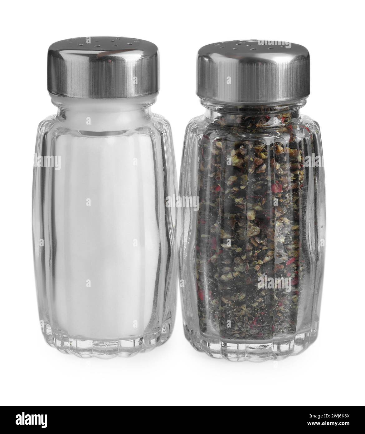 Salt and pepper shakers isolated on white Stock Photo - Alamy