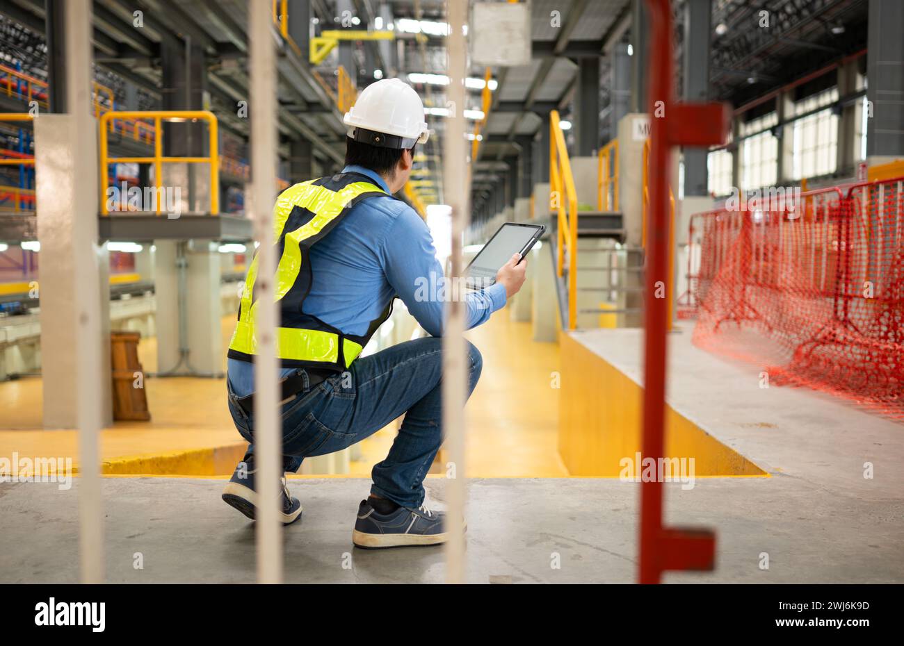 Electric vehicle engineer prepare to inspect electric train according ...