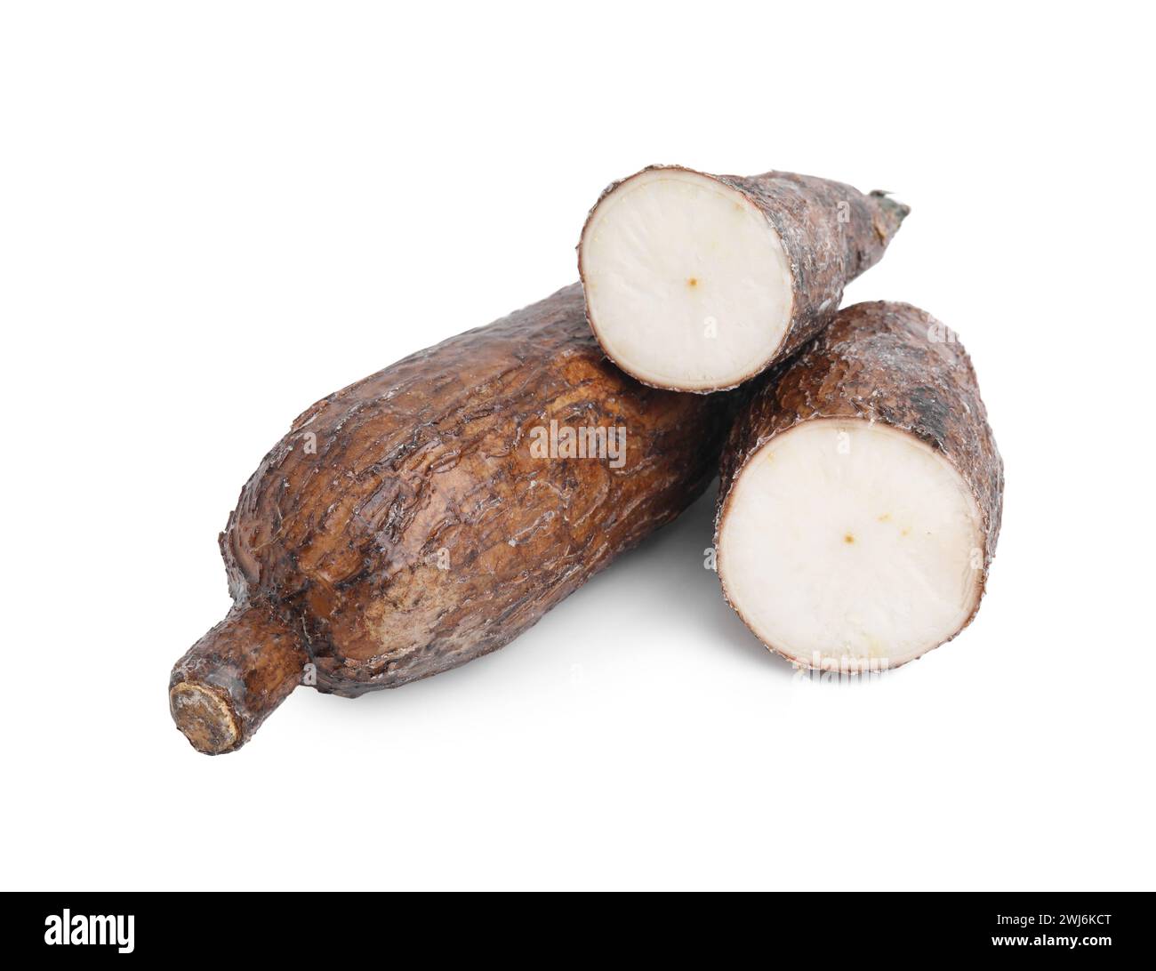 Whole and cut cassava roots isolated on white Stock Photo - Alamy
