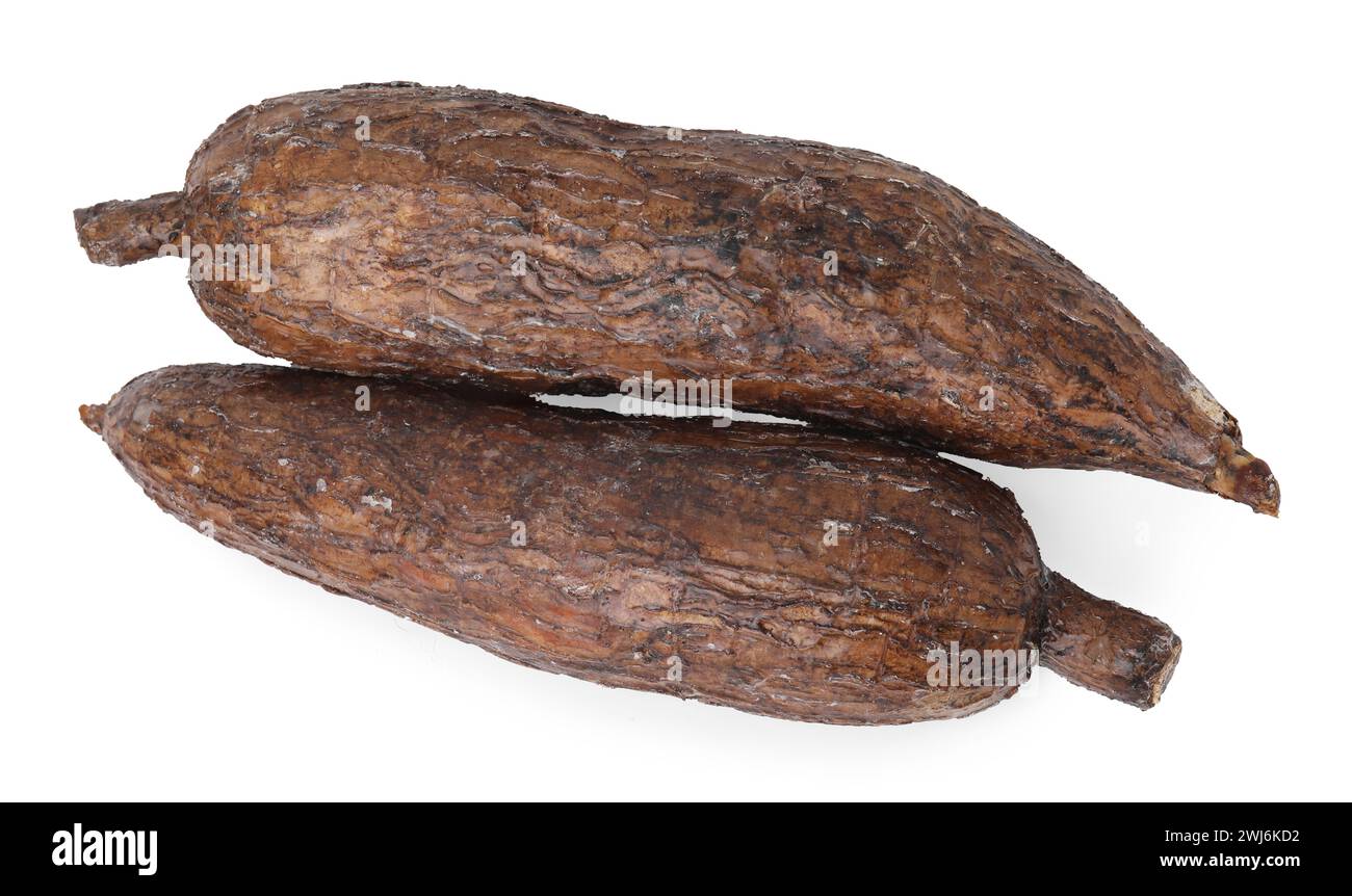 Two whole ripe cassava roots isolated on white, top view Stock Photo ...