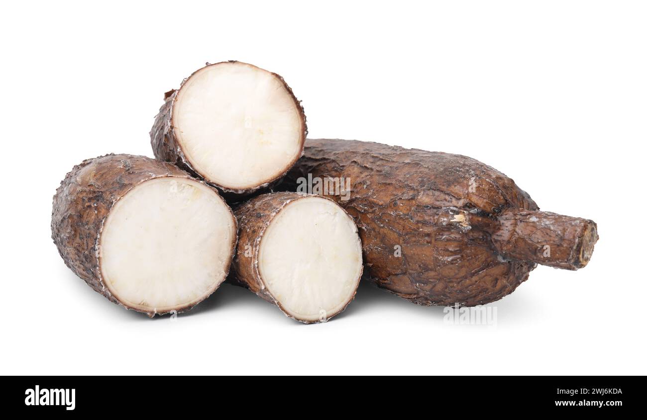 Whole and cut cassava roots isolated on white Stock Photo - Alamy