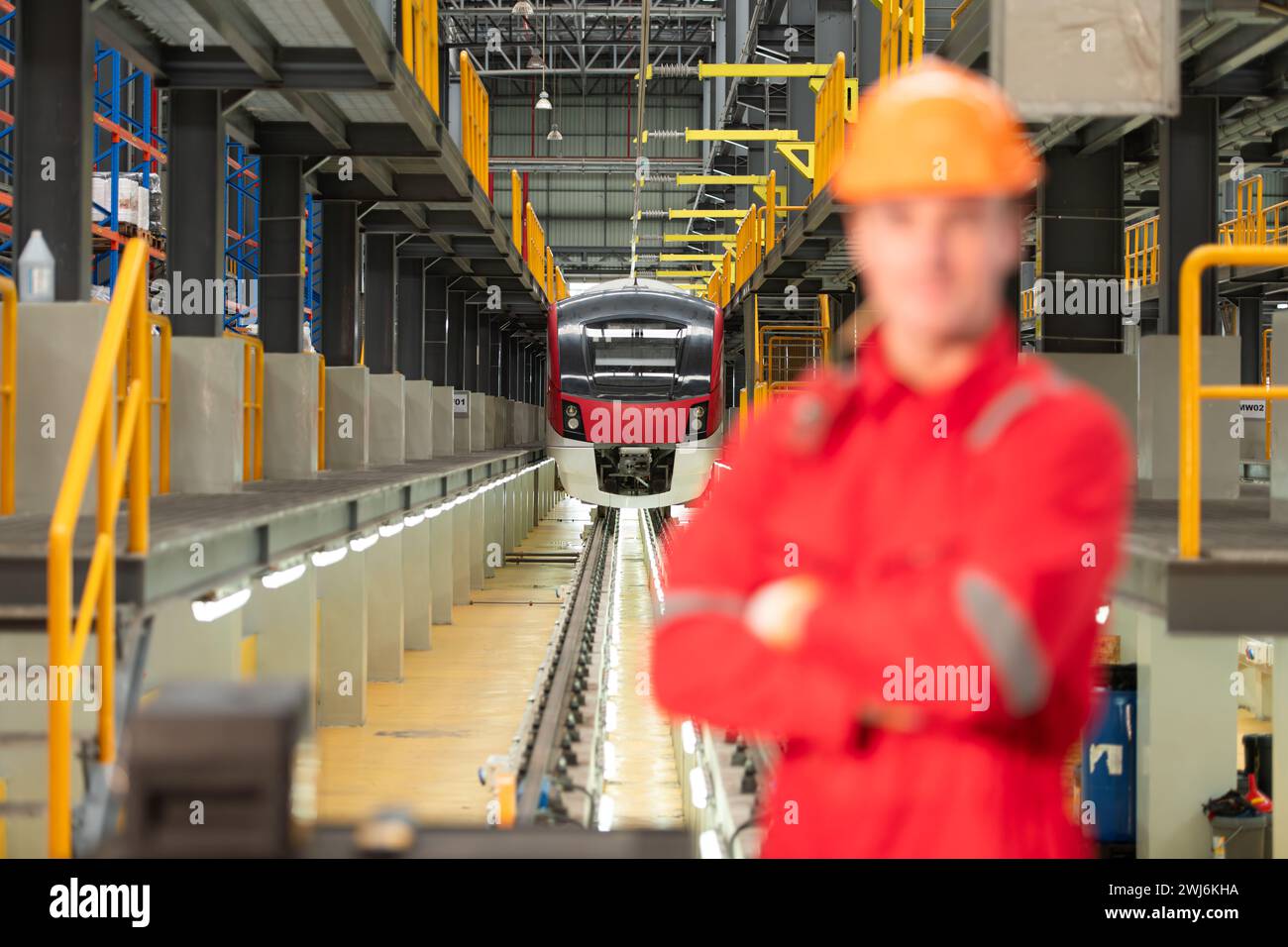 Portrait of engineer using repair tools of the electric train industry ...
